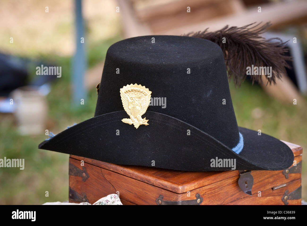 A Union officer's hat sit on a wooden chest in a Civil War reenactment ...