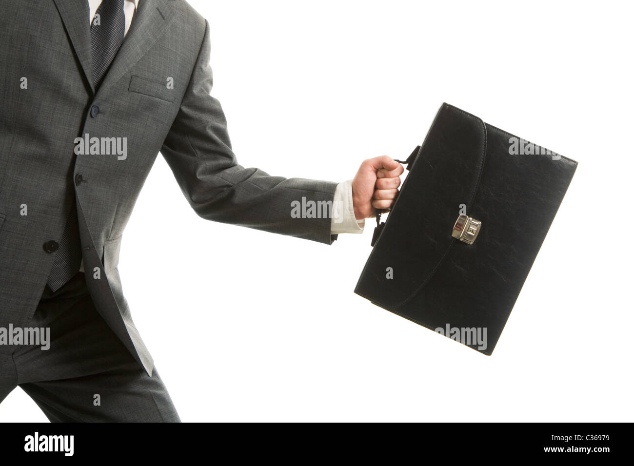 Close-up of businessman with briefcase in hand isolated on white ...