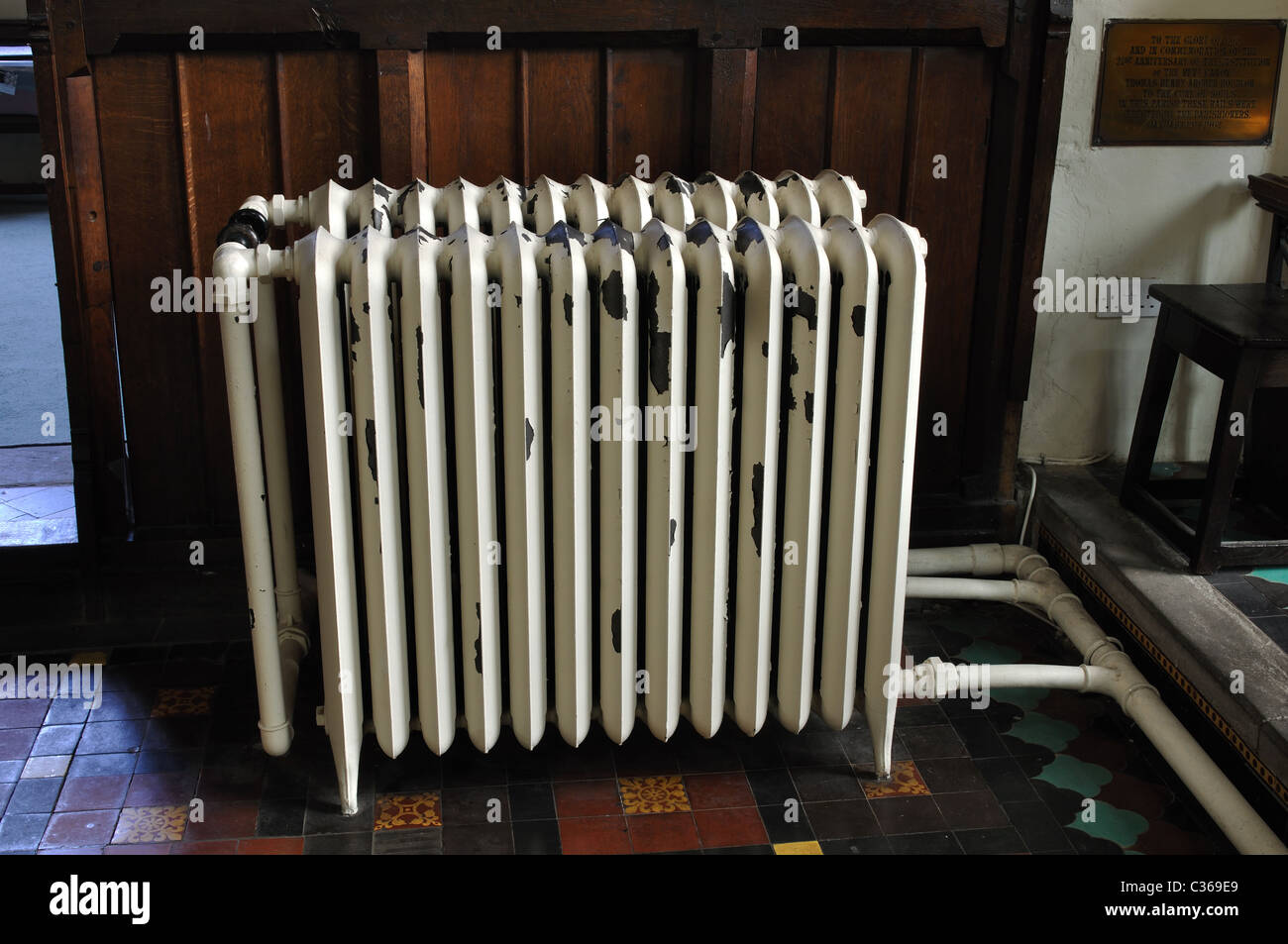 Old radiators in a church Stock Photo - Alamy