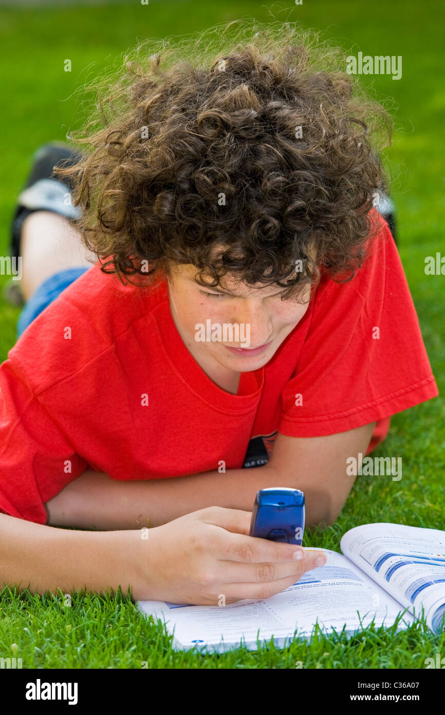 boy who learns and phones Stock Photo - Alamy