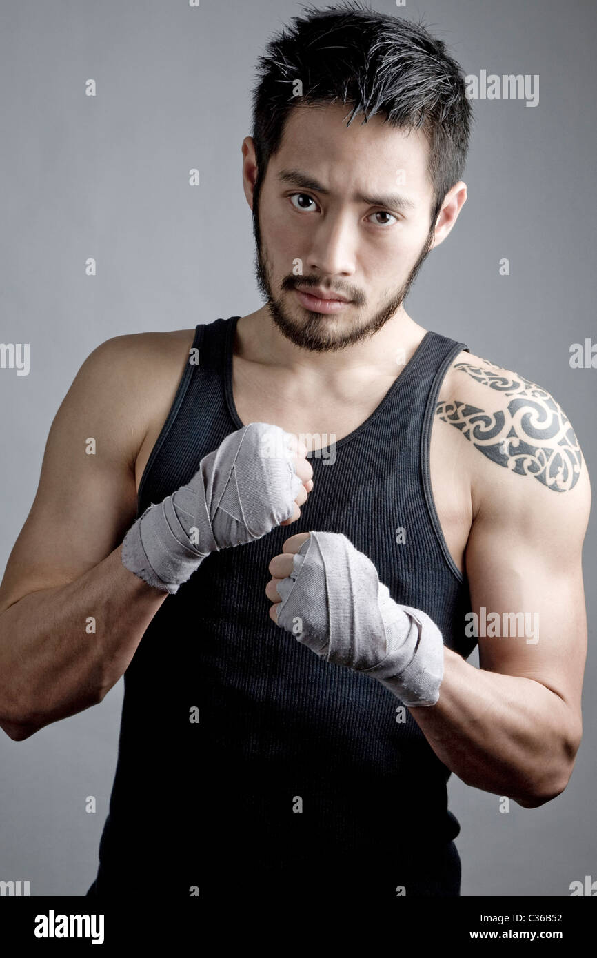 Box boxer chinese kick boxer man young man fight hi-res stock ...