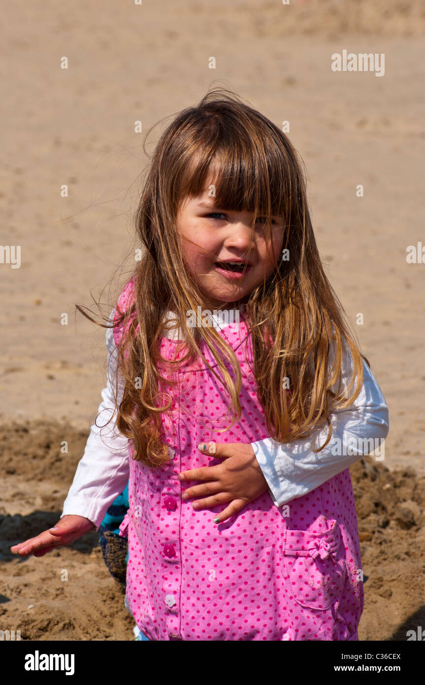 Young Child On A Beach Stock Photo - Alamy