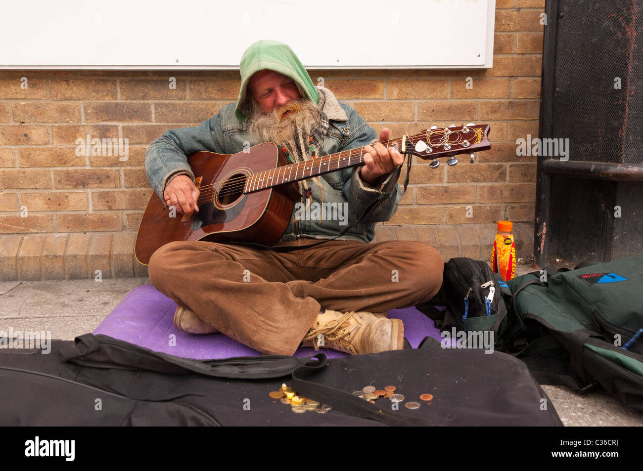 Busker money hi-res stock photography and images - Alamy