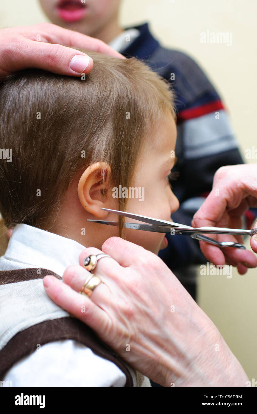 Shalev, Young Jewish boy of three having his first ritual haircut ...