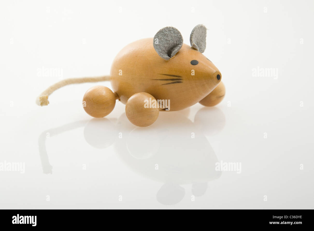 wooden mouse painted on white background Stock Photo - Alamy