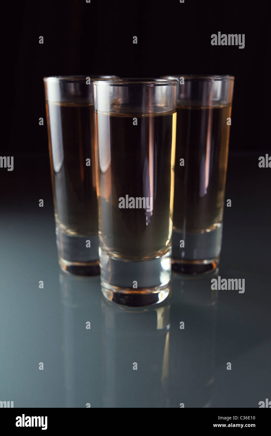 tequila on a glass table Stock Photo - Alamy