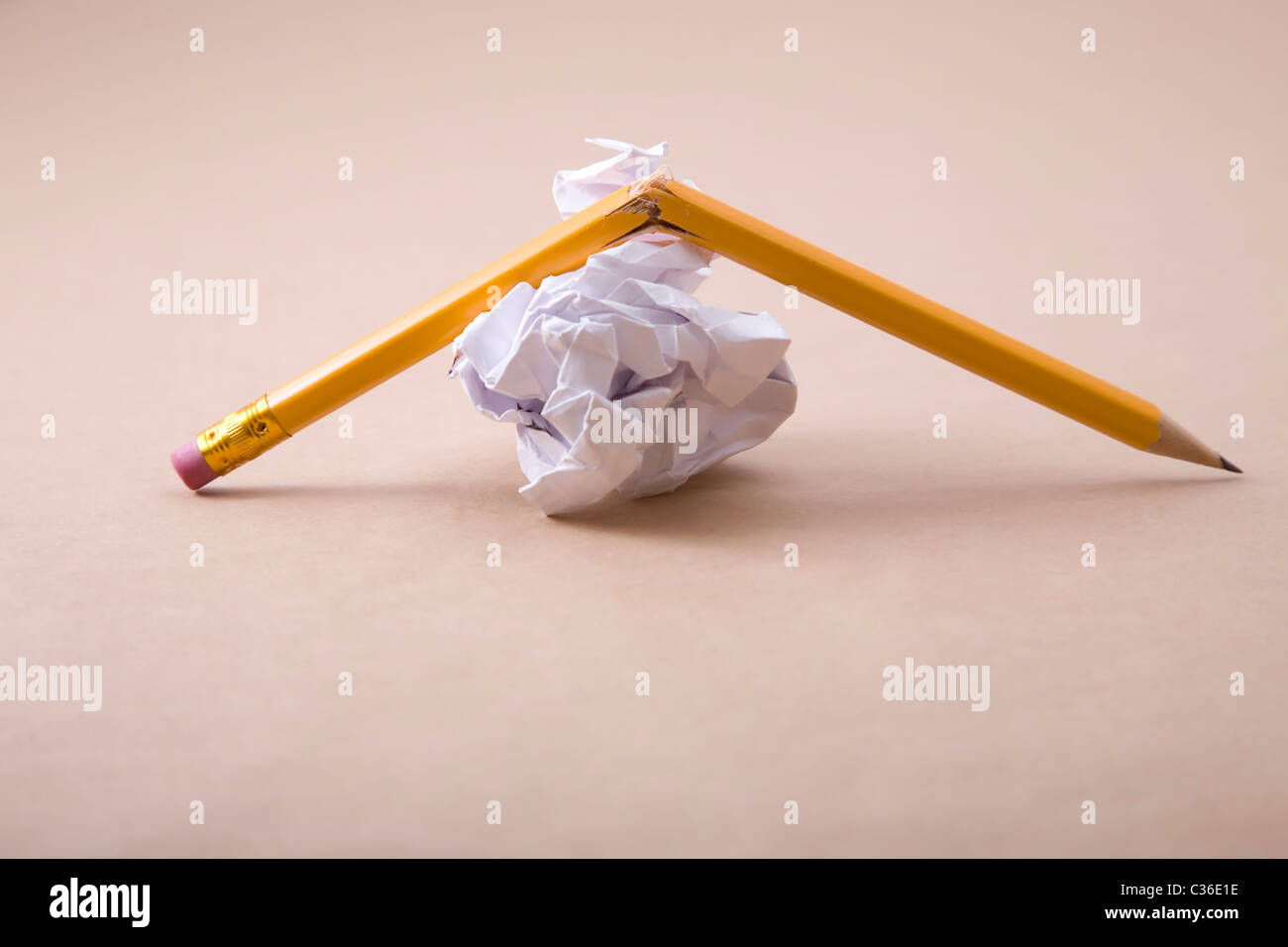 crumpled paper and crushed yellow pencil Stock Photo - Alamy