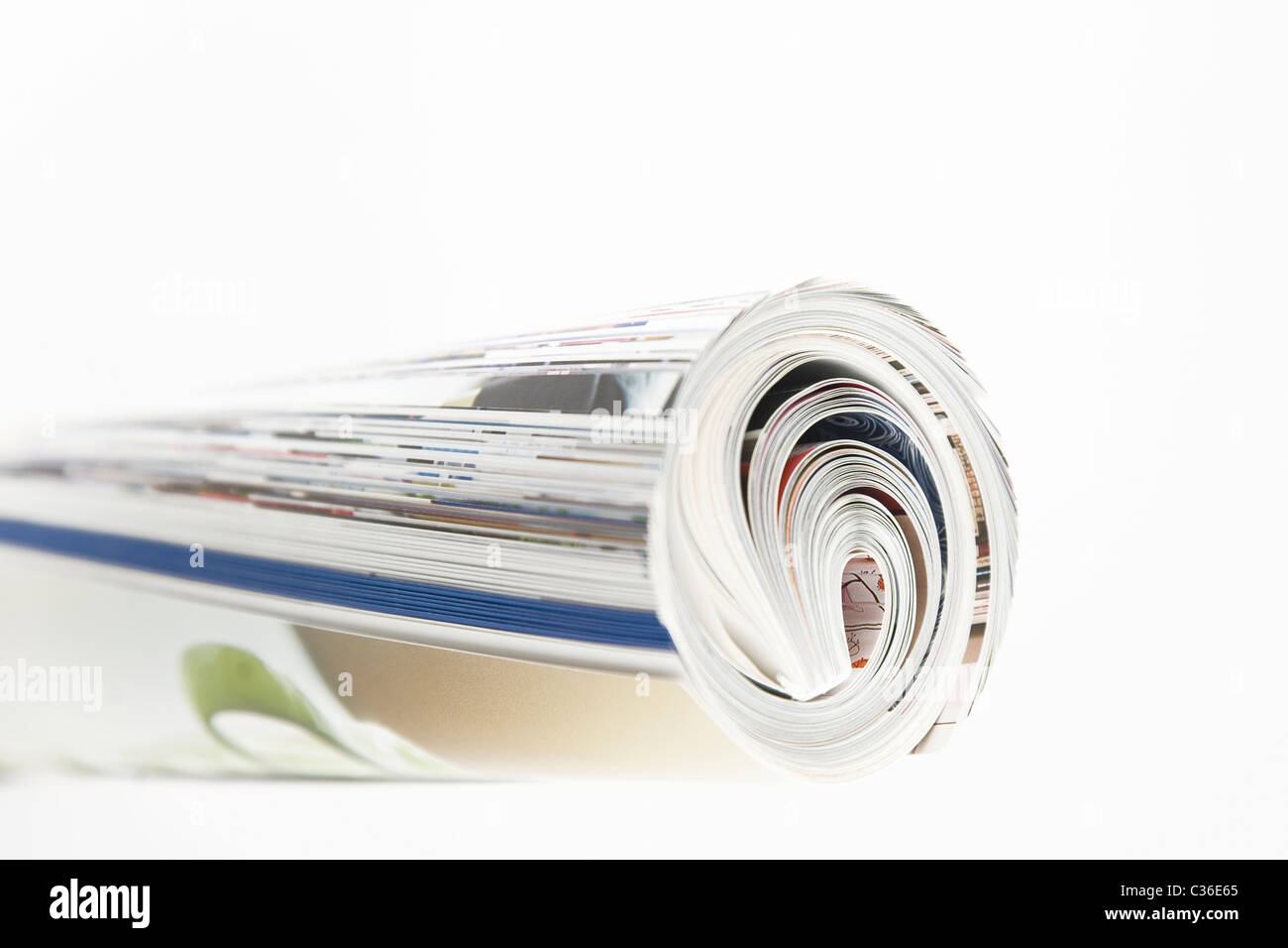 closeup of Magazine Roll isolated on white Stock Photo - Alamy