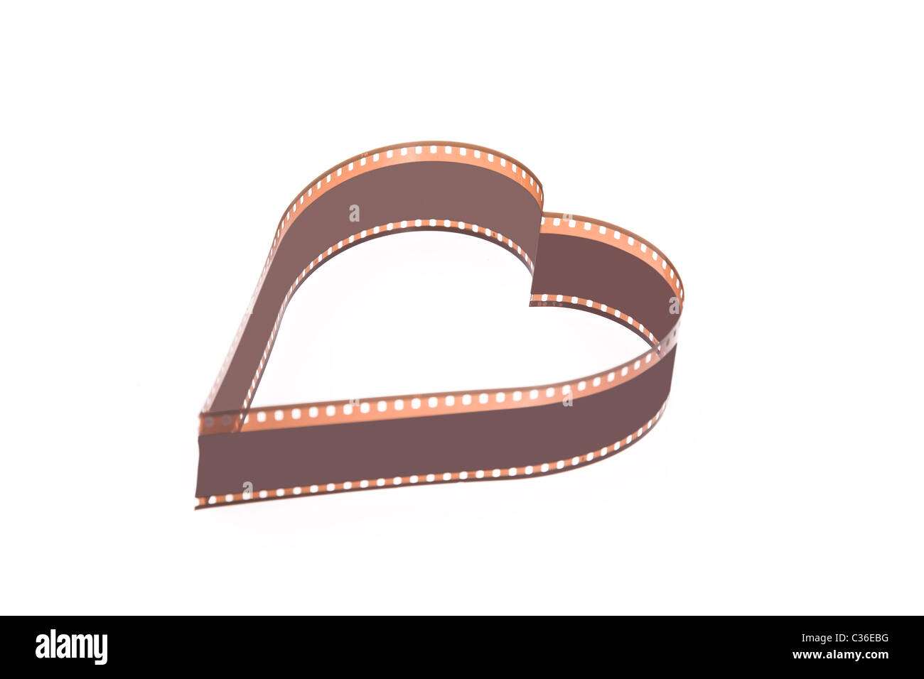 film strip in shape of heart on white background Stock Photo - Alamy