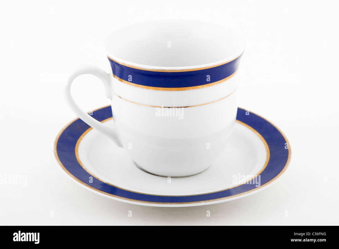 white and blue cup of coffee isolated Stock Photo - Alamy