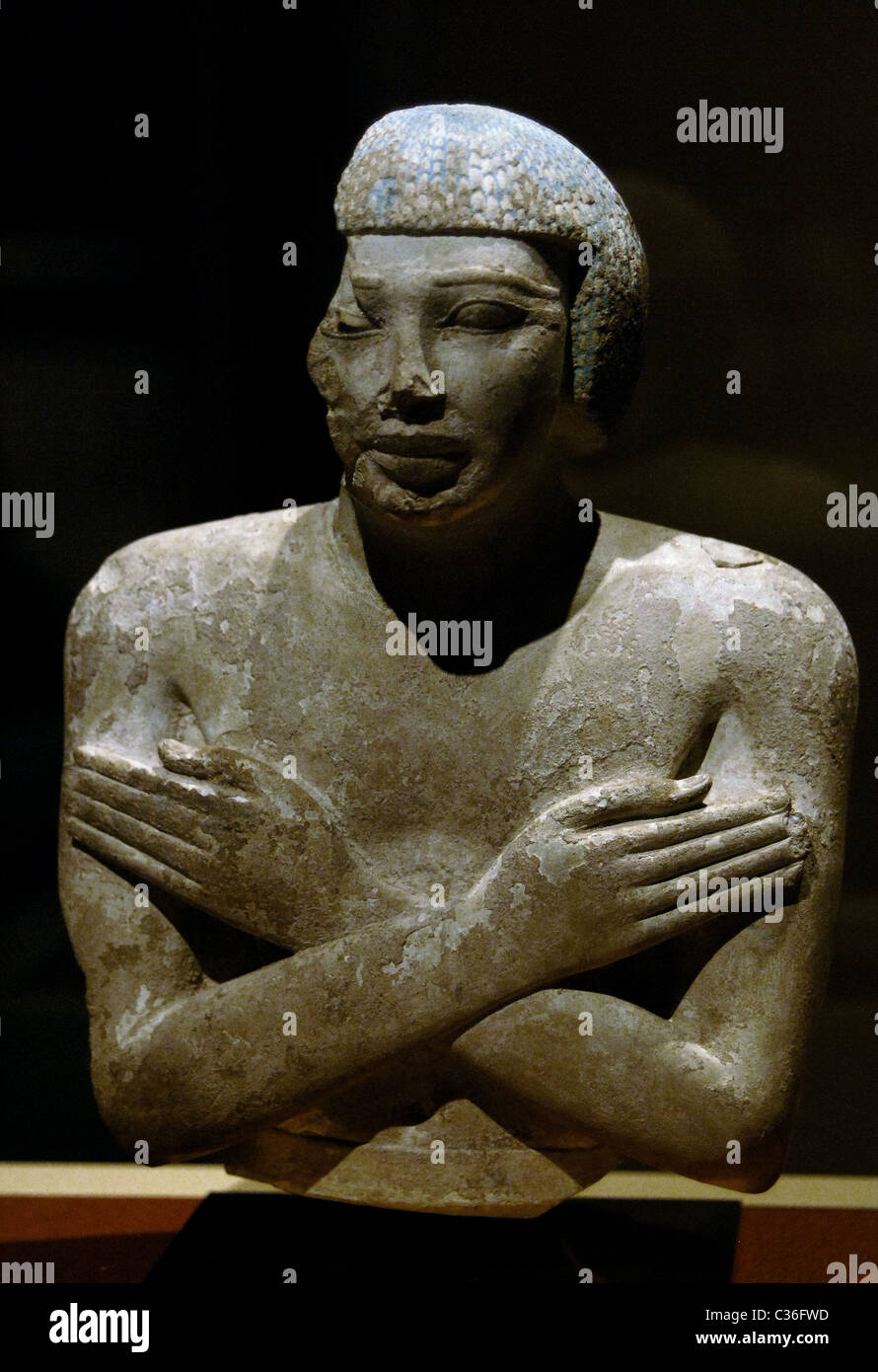 Egyptian Art. Upper Part of a statue representing a man called Iker ...