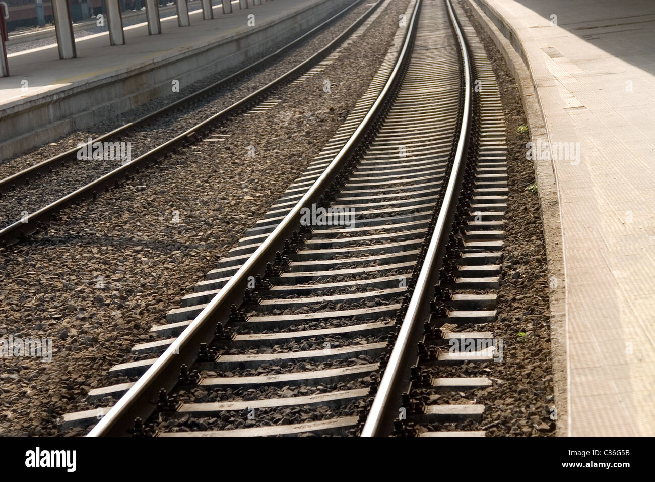 old railway in train station, perspective view Stock Photo - Alamy