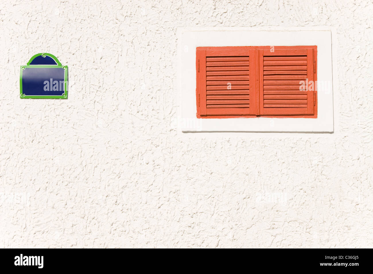 white wall and red wooden window, front view Stock Photo - Alamy