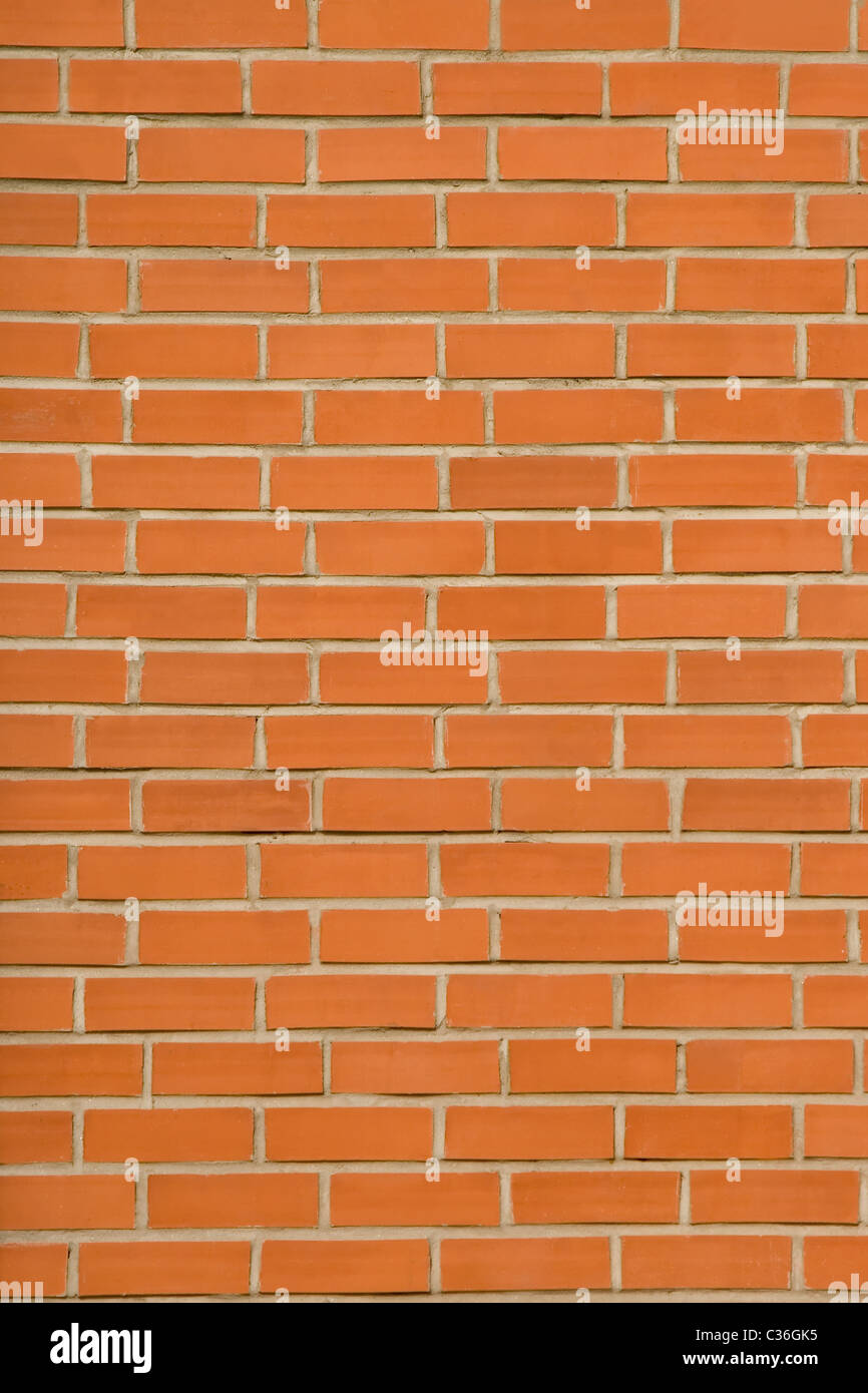 front view of red bricks wall with concrete Stock Photo - Alamy