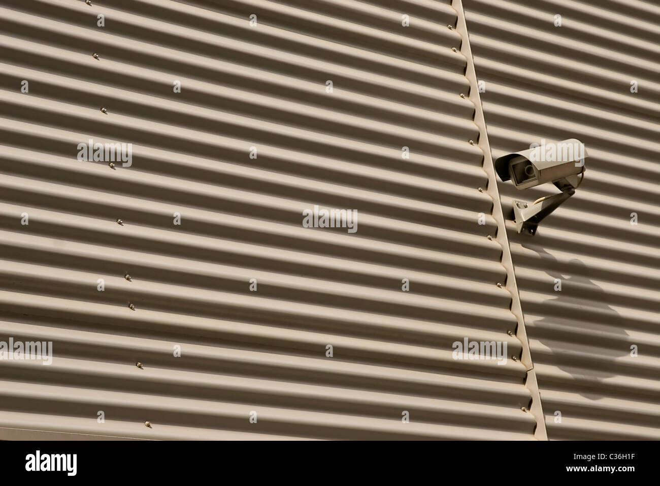 detail of surveillance camera mounted on metal facade Stock Photo - Alamy