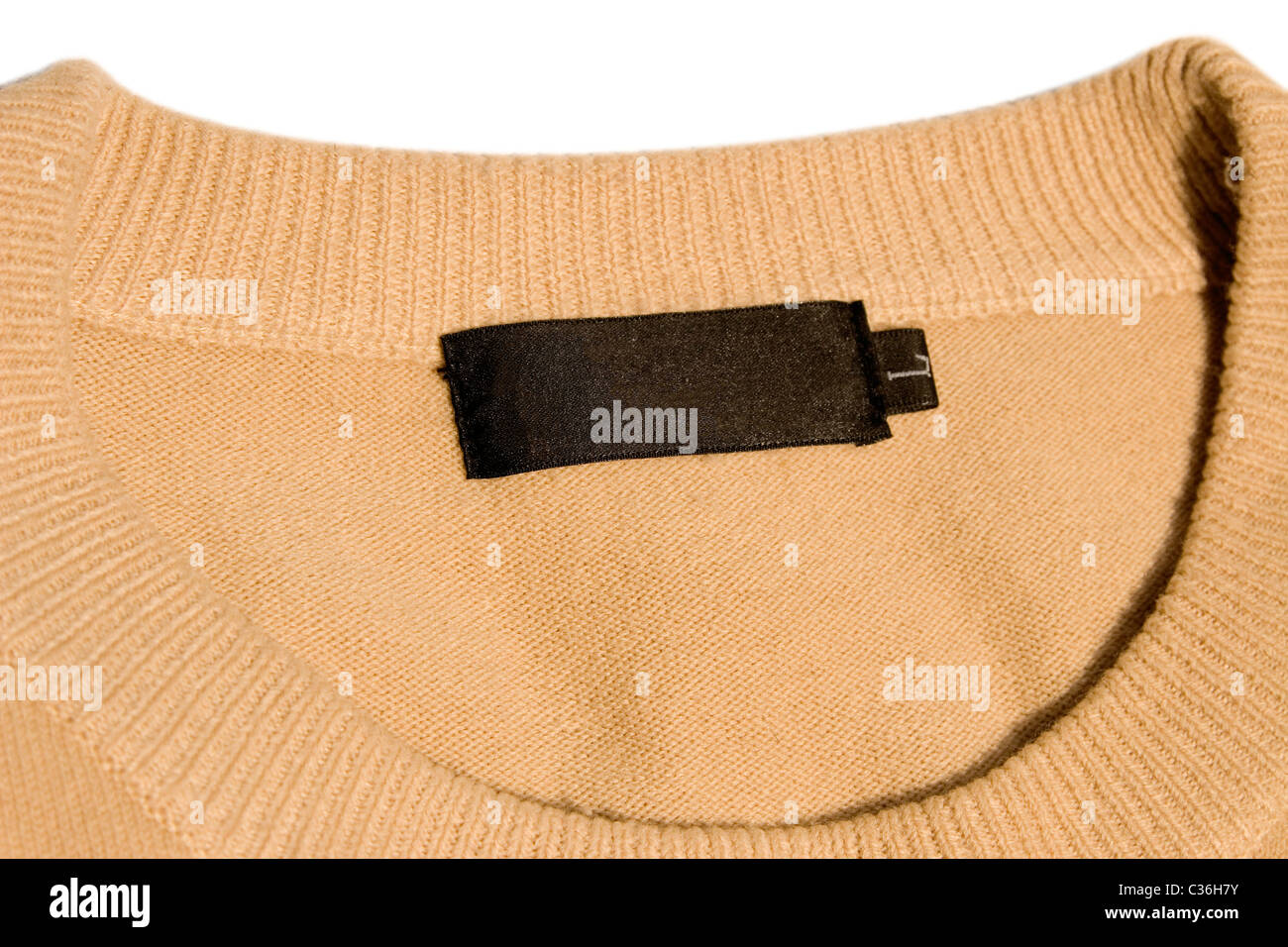 close-up of clothing label with L size Stock Photo - Alamy