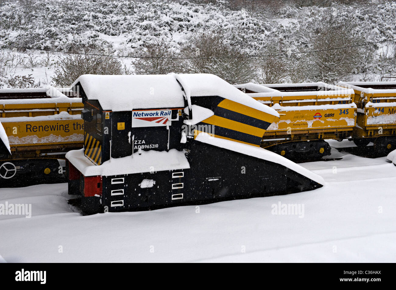 Railway Snowplough and Trucks Seen in Falling Snow at Tonbridge, Kent ...