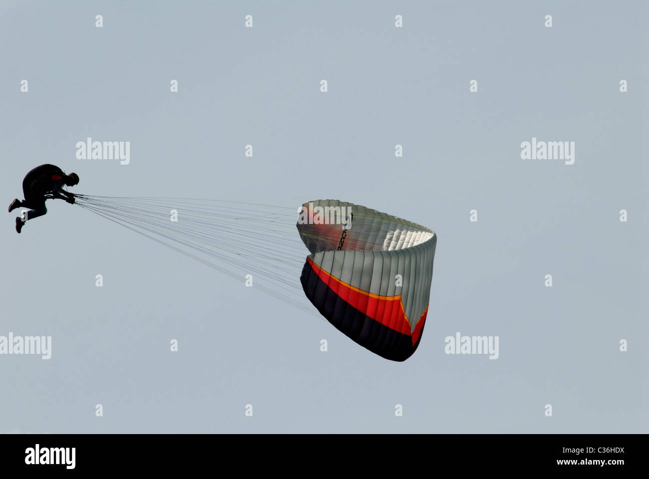 Acrobatic Para glider executing wing over manoeuvre Stock Photo - Alamy