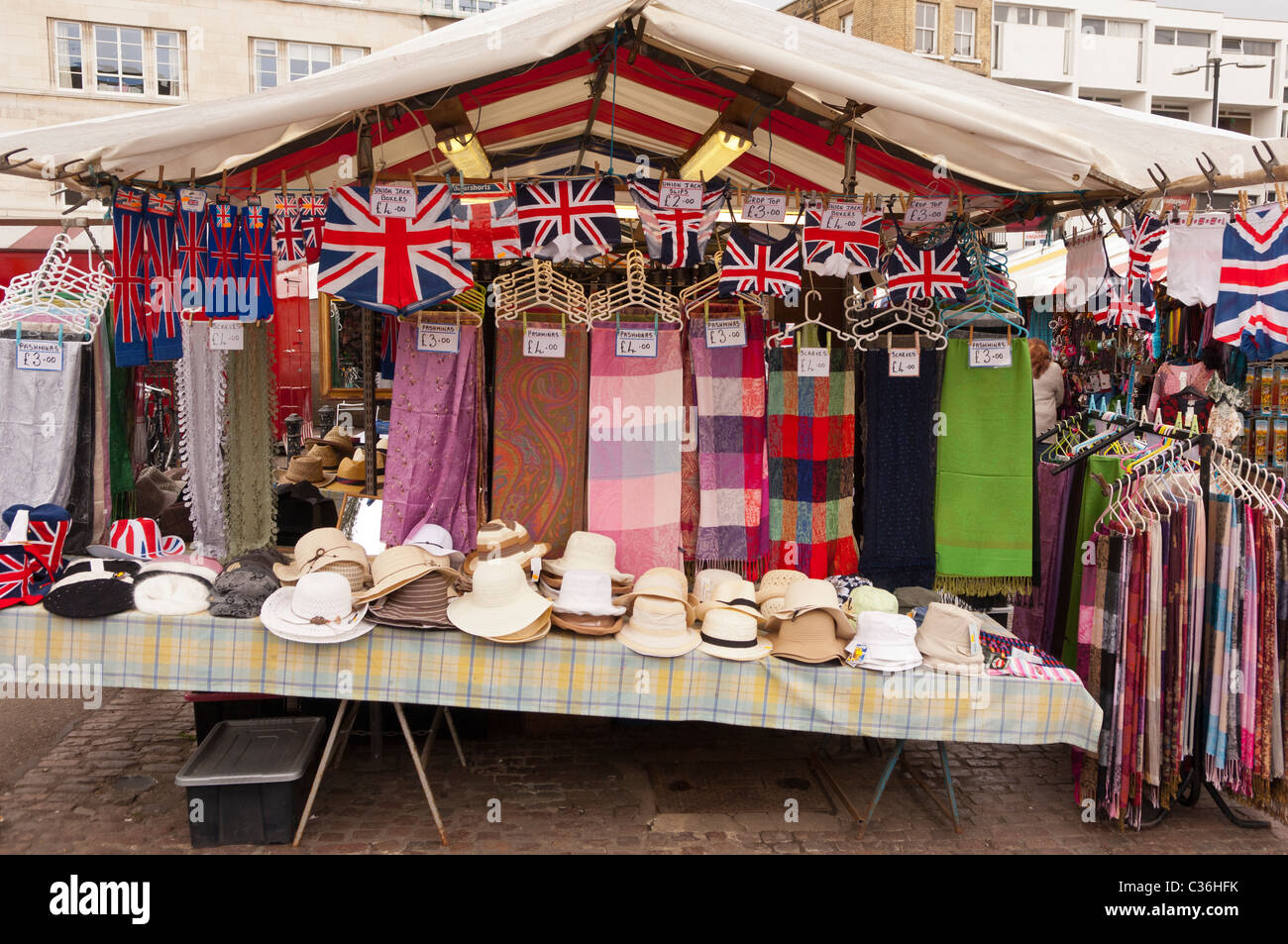 Hats and union jack items for sale on a market stall in Cambridge ...