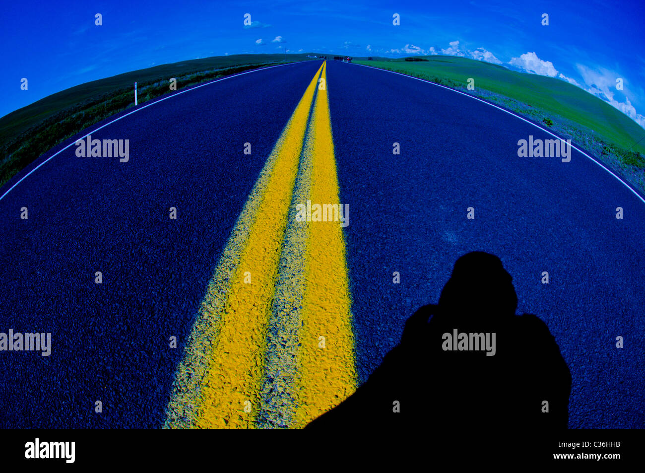 Abstract pattern of yellow line and shadow on road Stock Photo - Alamy