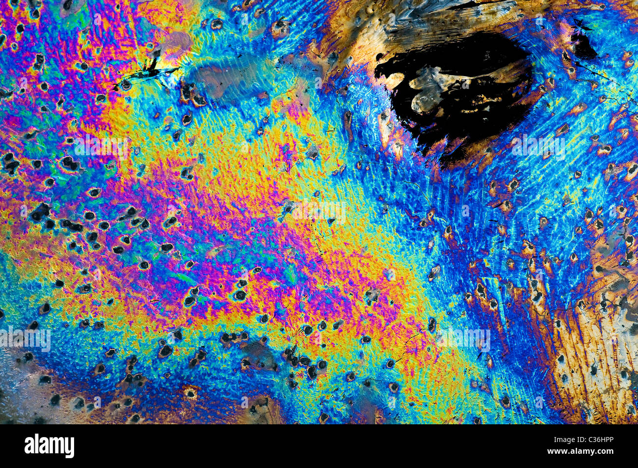 Colourful abstract oil patterns on ice Stock Photo - Alamy