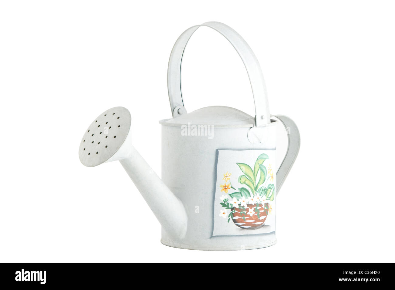 front view of vintage white sprinkler with flower print Stock Photo - Alamy