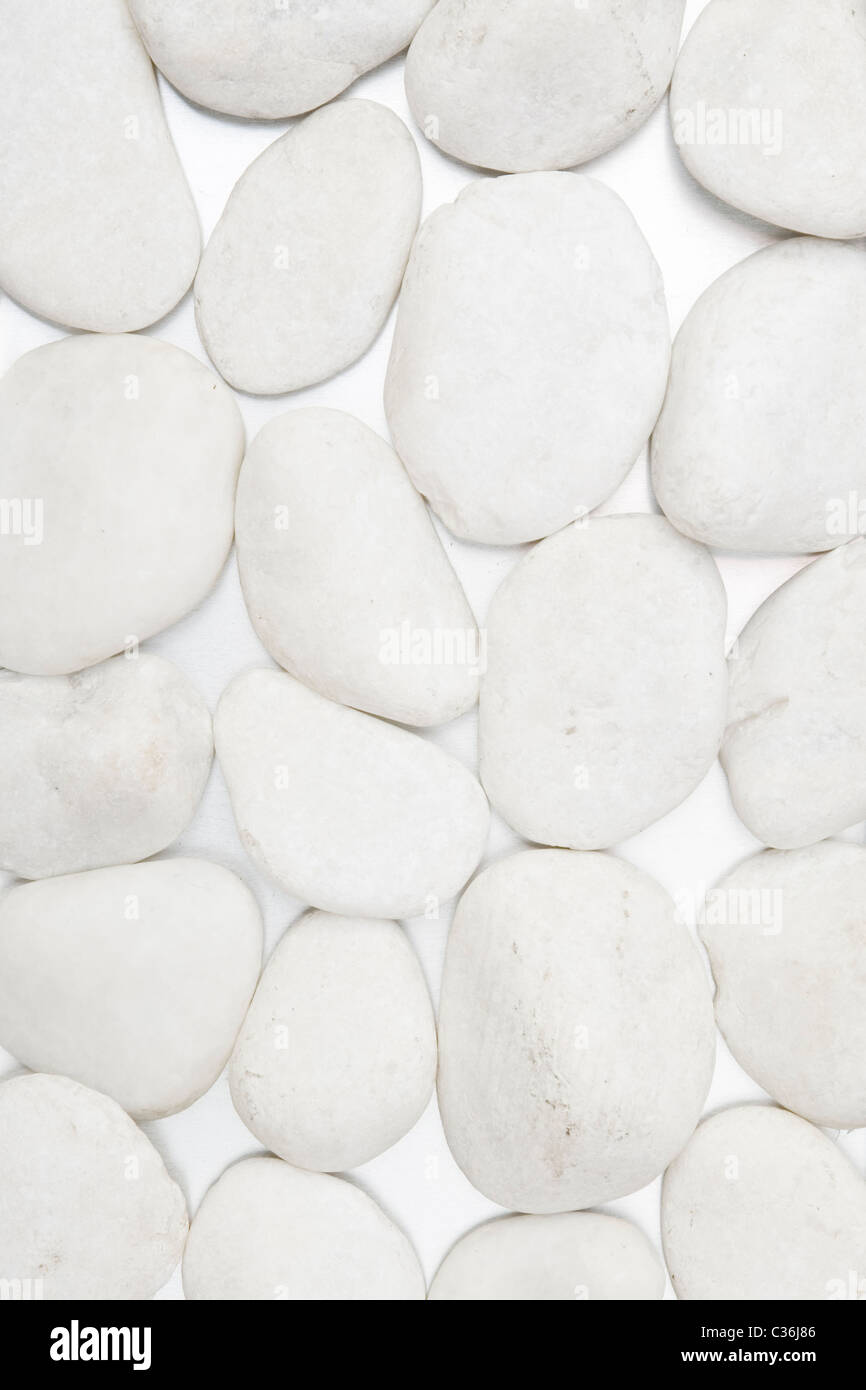 close-up of few white stones, front view Stock Photo - Alamy
