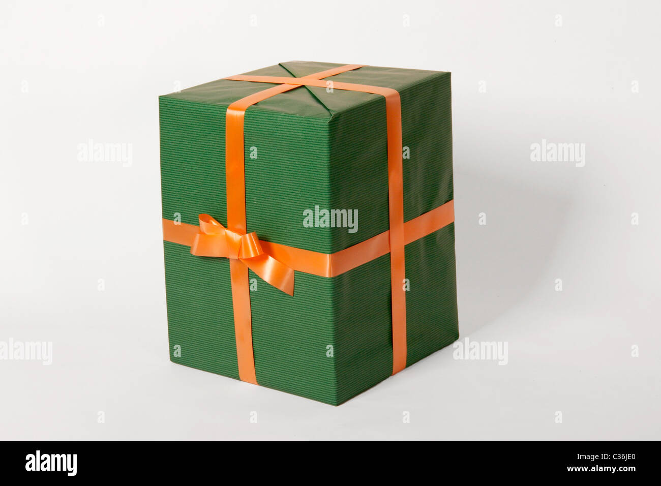green present and orange ribbon Stock Photo - Alamy