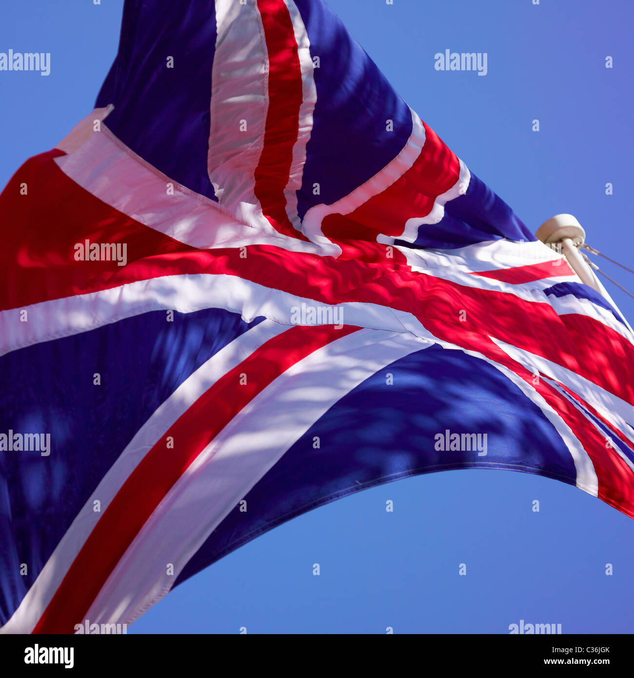 Flying Union Jack Flag, United Kingdom - minimal focus Stock Photo - Alamy
