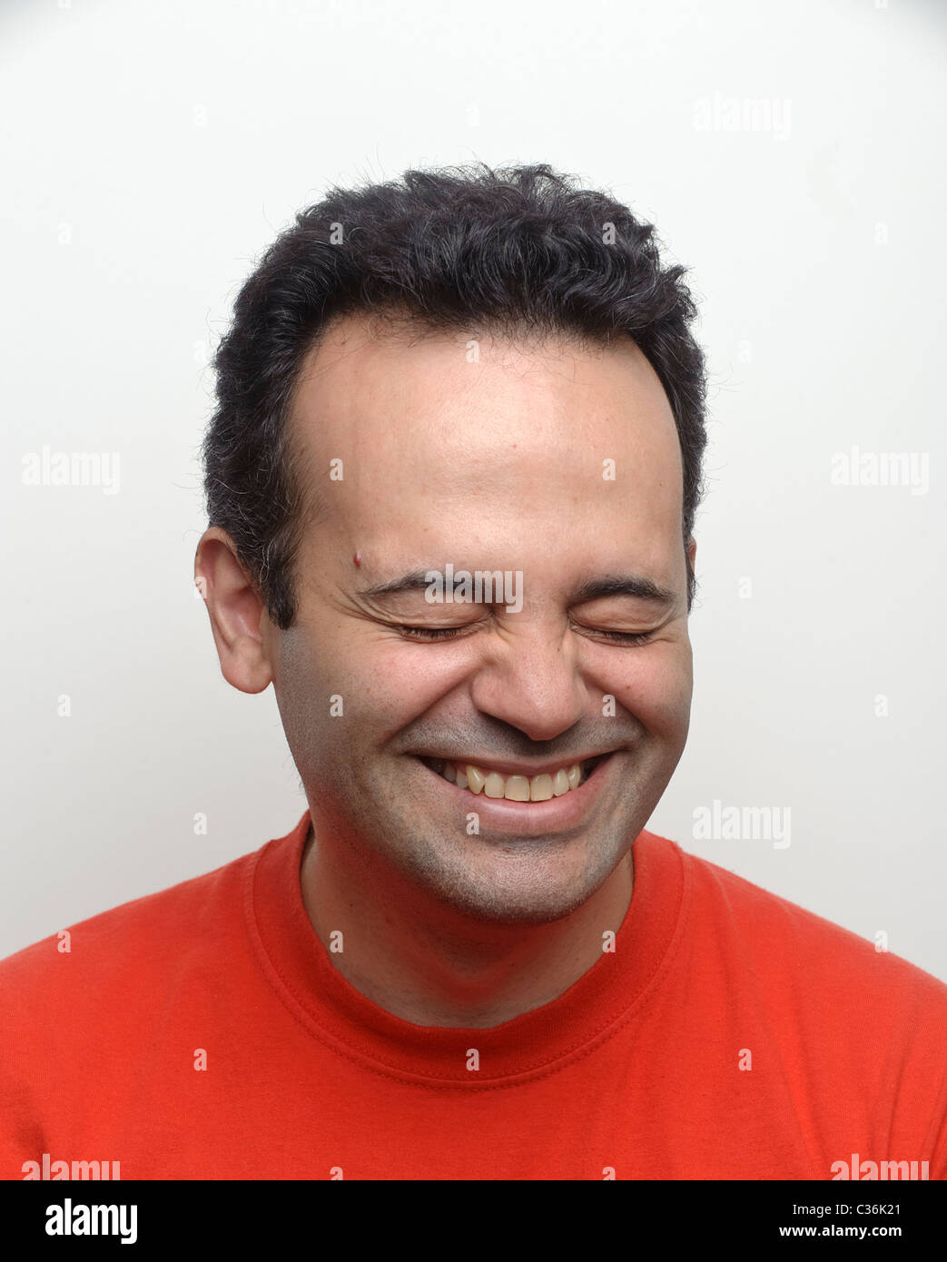 Guy 20s happy eyes closed hi-res stock photography and images - Alamy