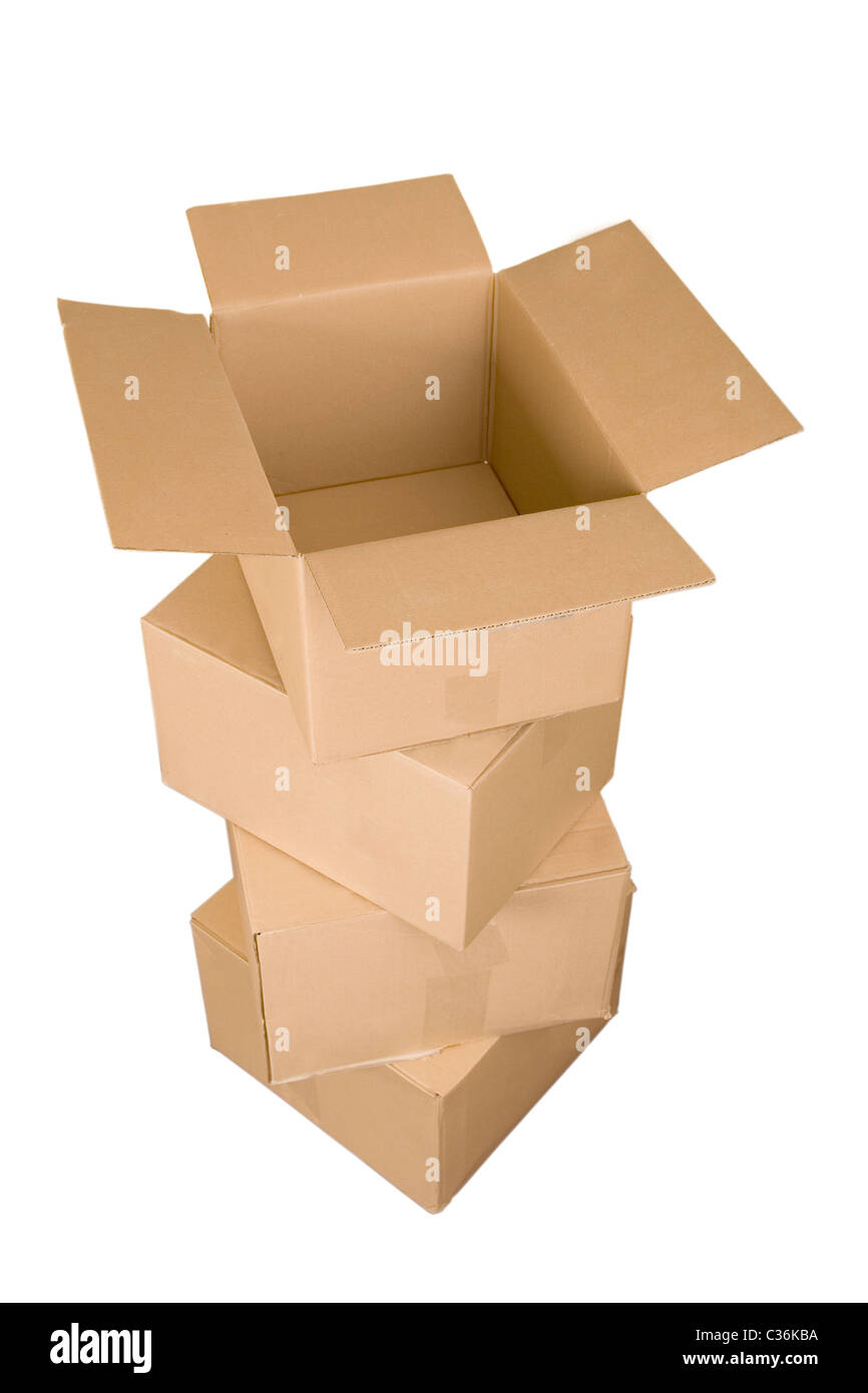 Brown cardboard boxes arranged in stack on white background Stock Photo ...