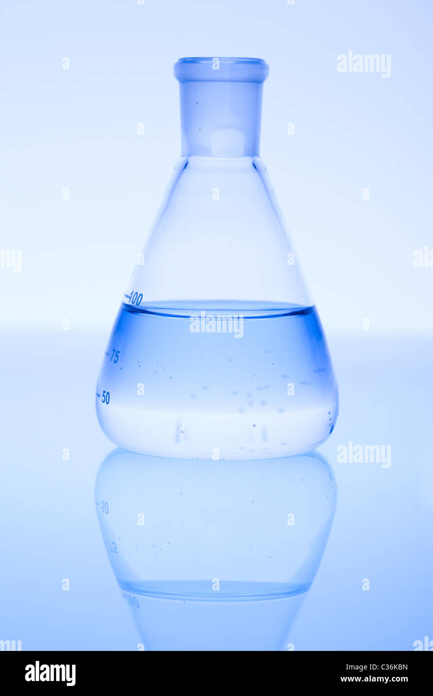 Laboratory glass in blue scenery Stock Photo - Alamy
