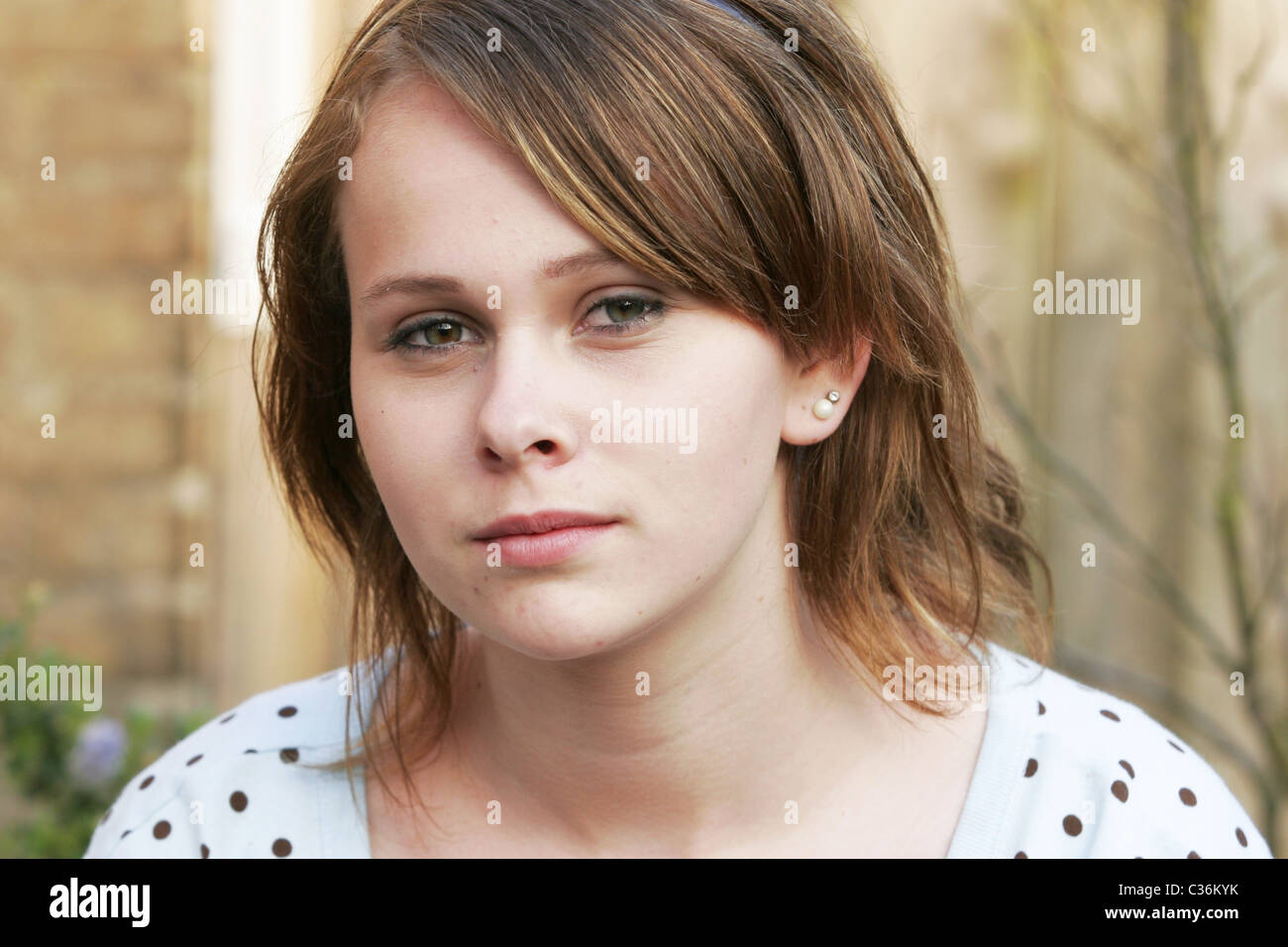 Serious face vulnerable natural teenie looking at camera serious face ...