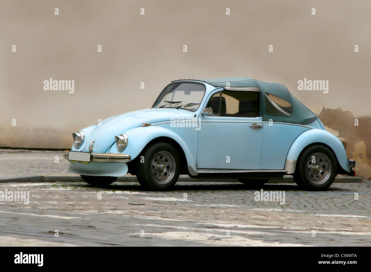famous beetle in front of a wall Stock Photo - Alamy