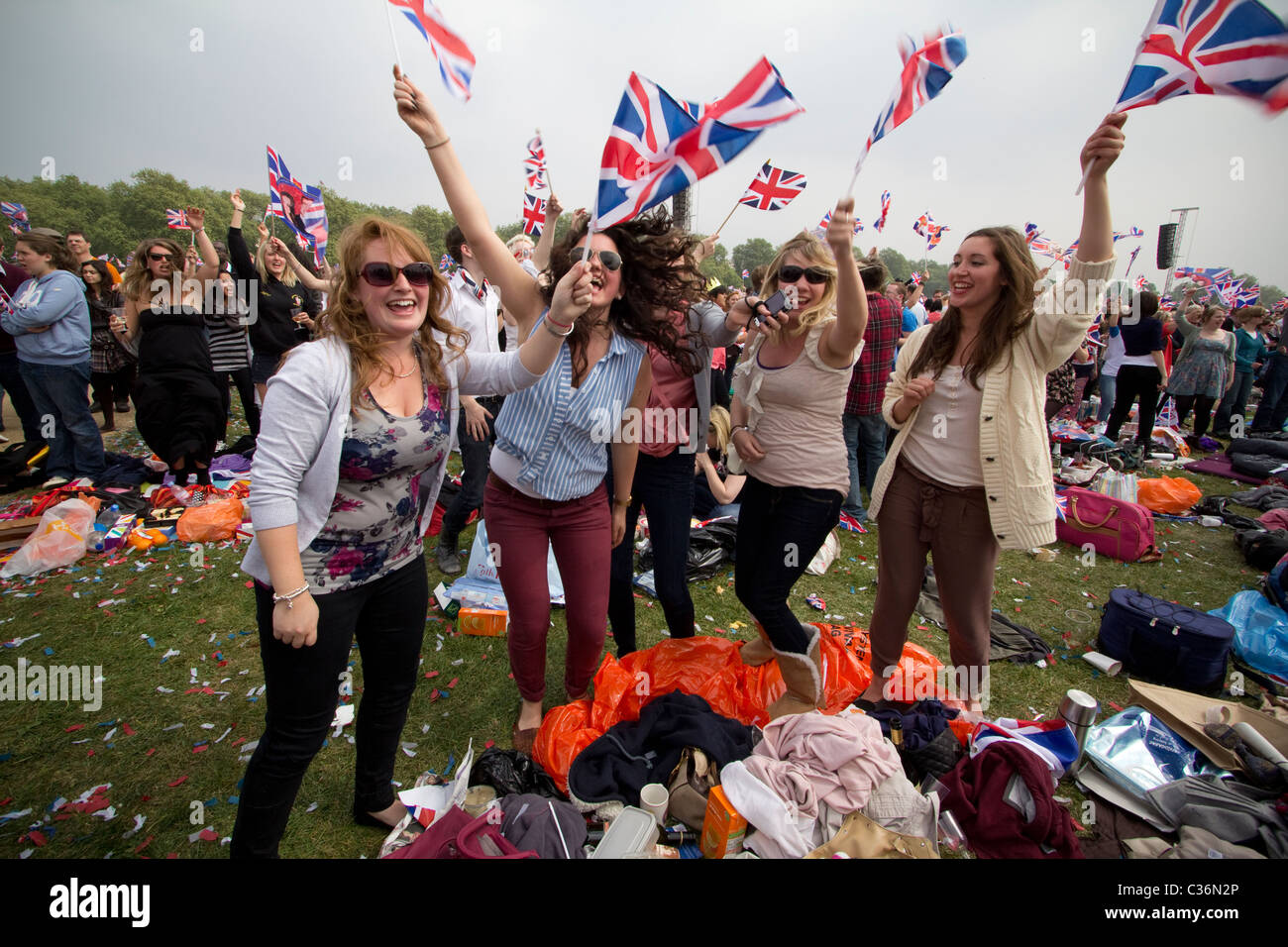 Royal wedding female revellers with union jack flags dancing in Hyde ...
