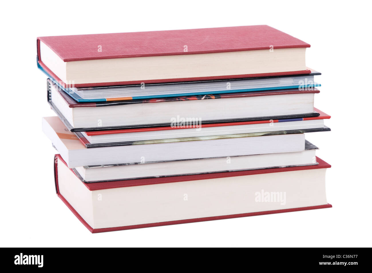 color tower books on white background arranged in stack Stock Photo - Alamy
