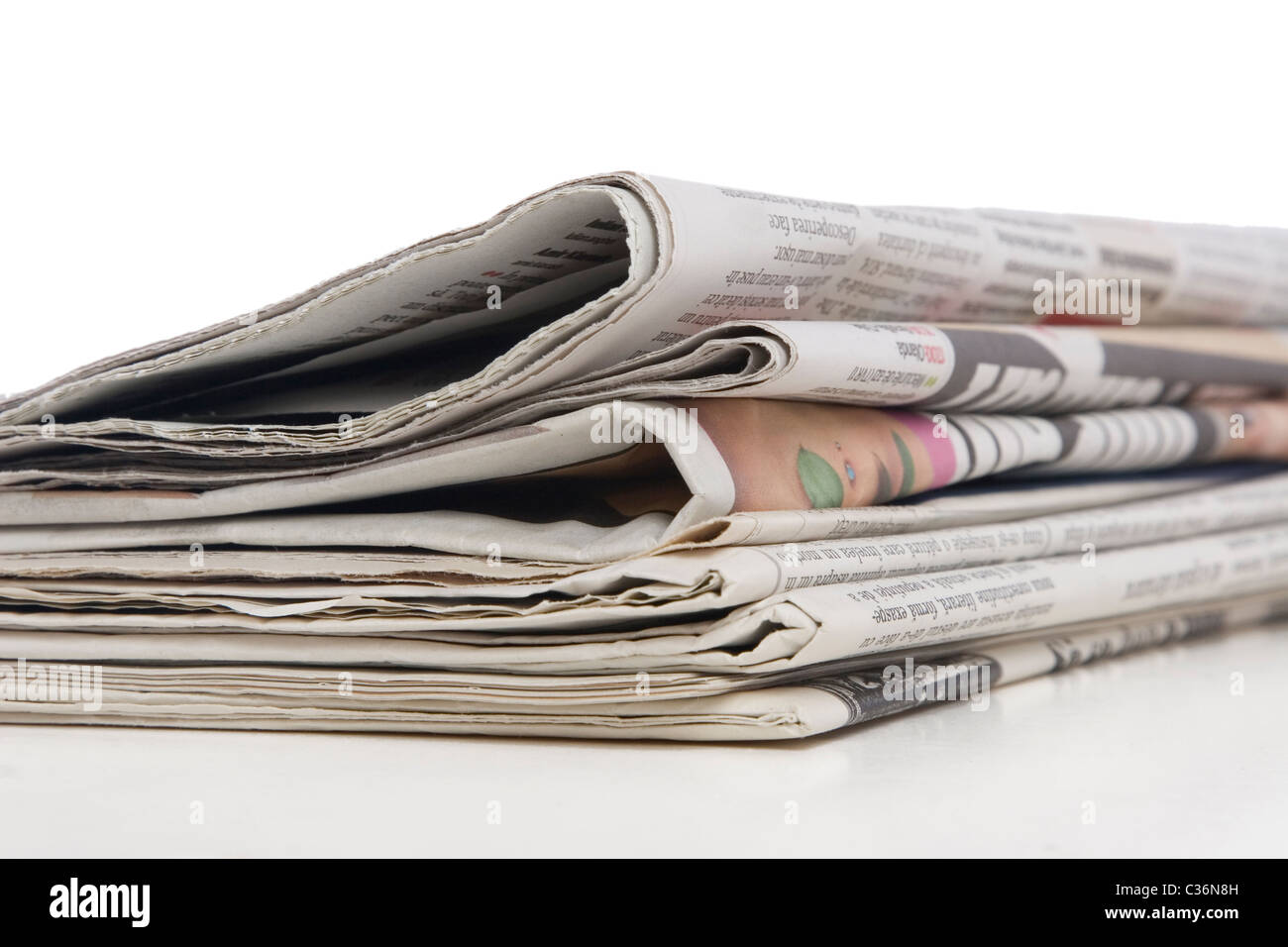 newspaper stack on white background, information concept Stock Photo ...