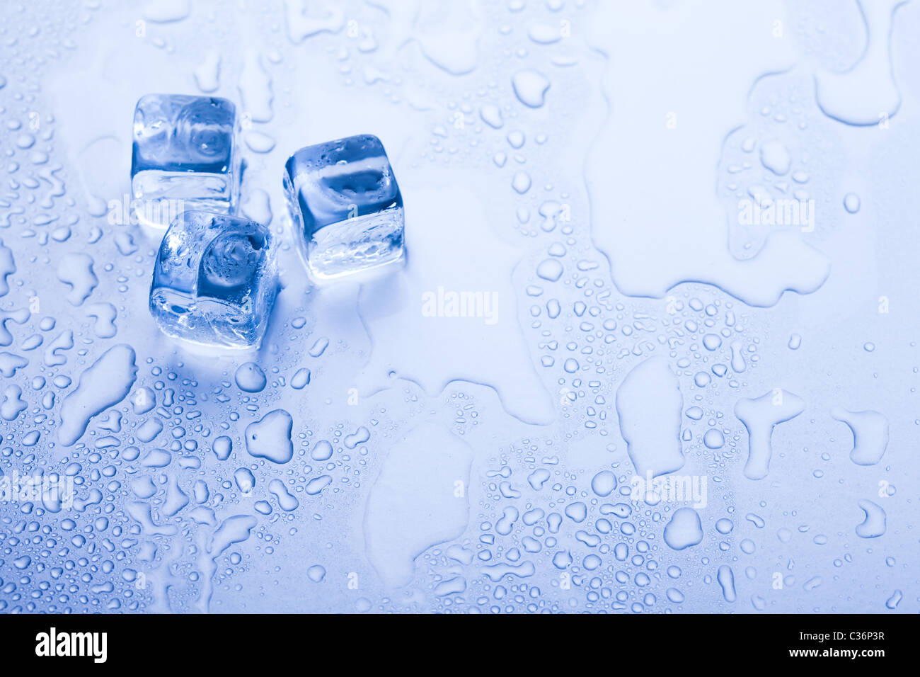 Ice cubes & aqua Stock Photo - Alamy