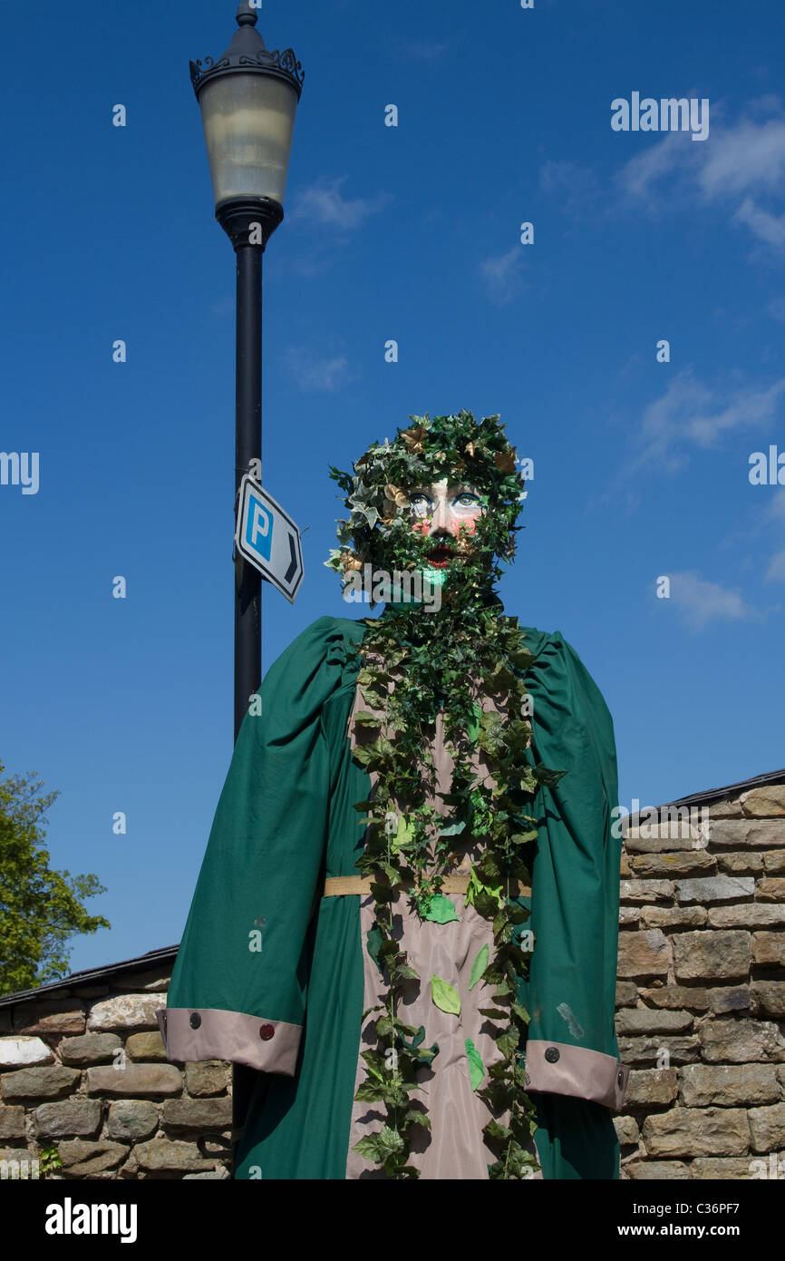 Tall Cloaked Lady, a giant female scarecrow, covered in green Ivy at ...