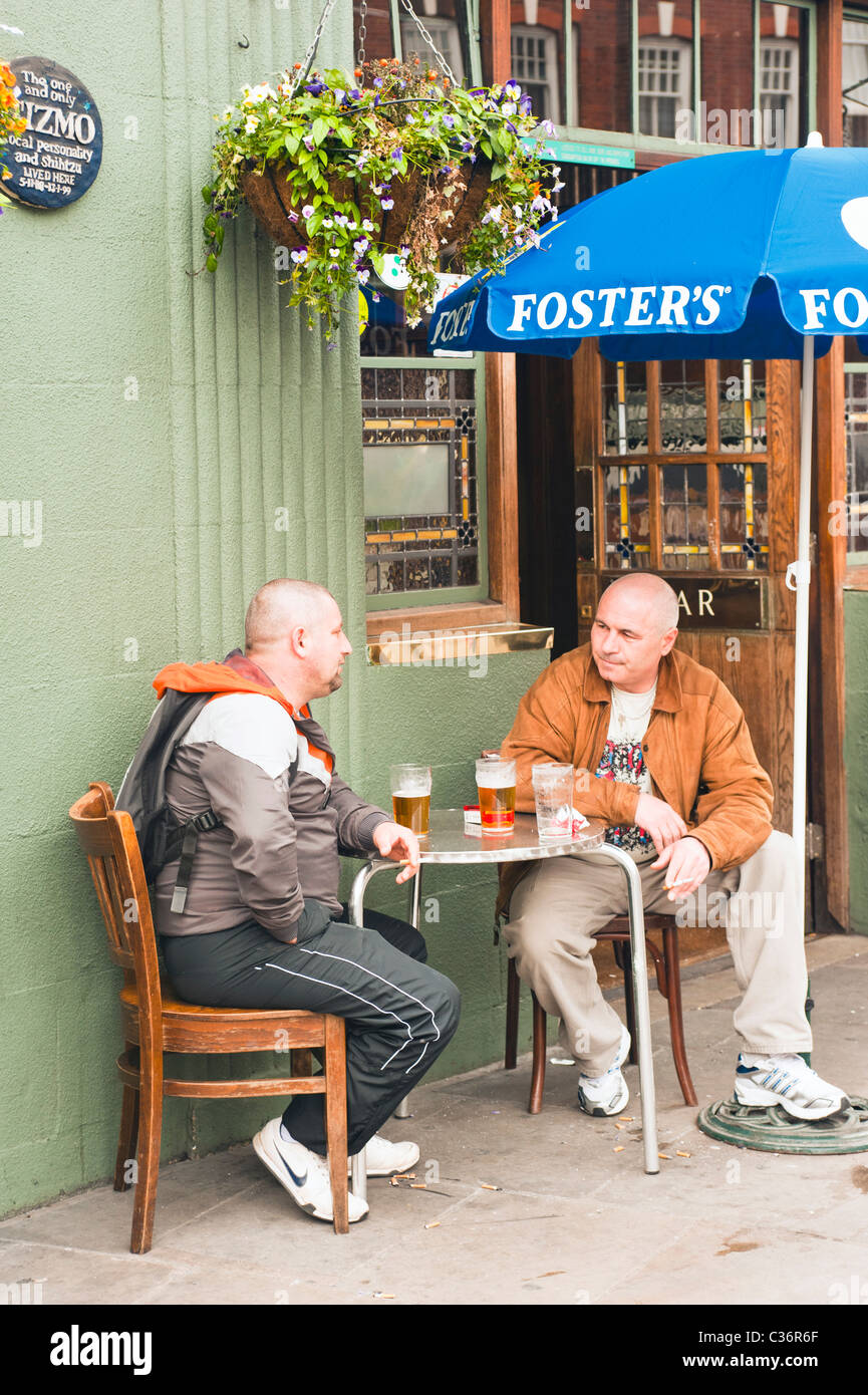 Men Drinking Outside Pub Stock Photos & Men Drinking Outside Pub Stock ...