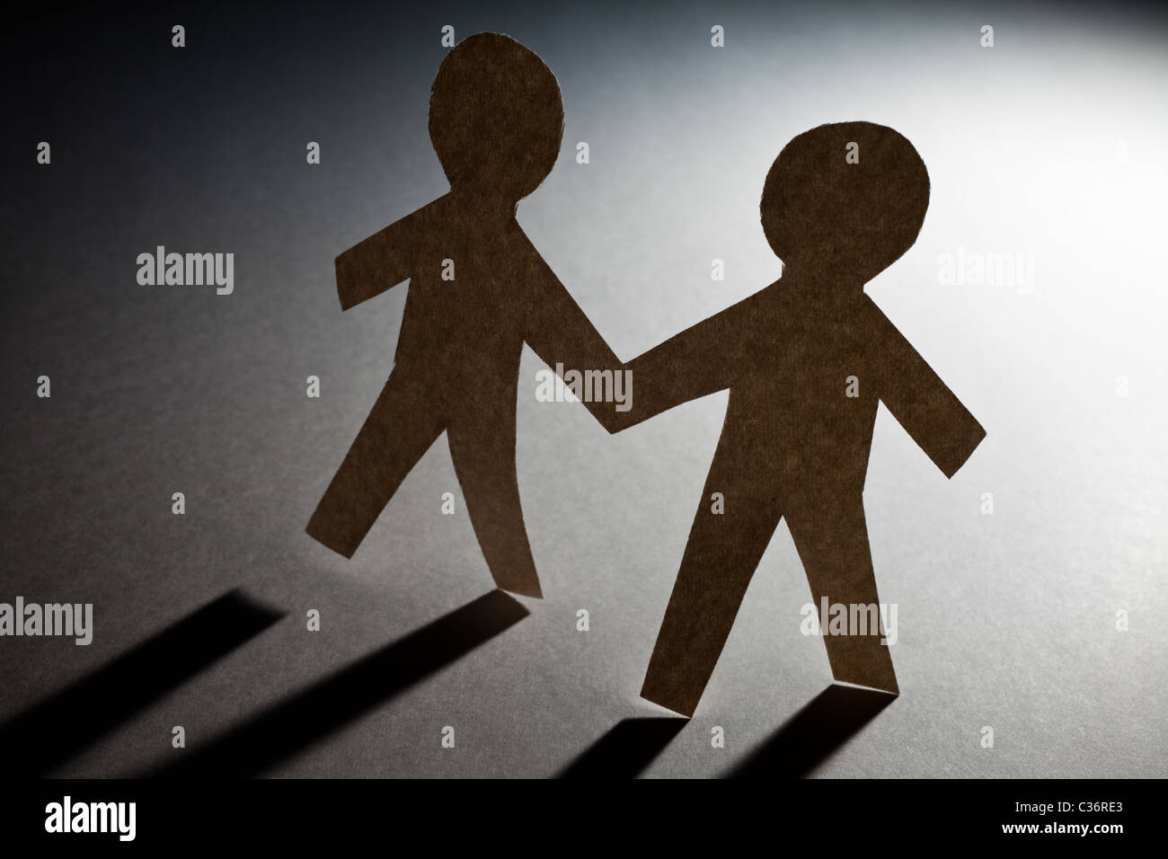 Paper Chain Men, concept of Teamwork Stock Photo - Alamy