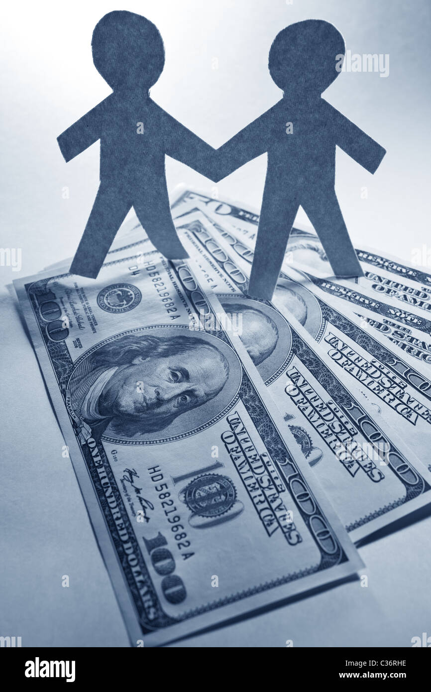 Dollar and Paper Chain Men close up Stock Photo - Alamy
