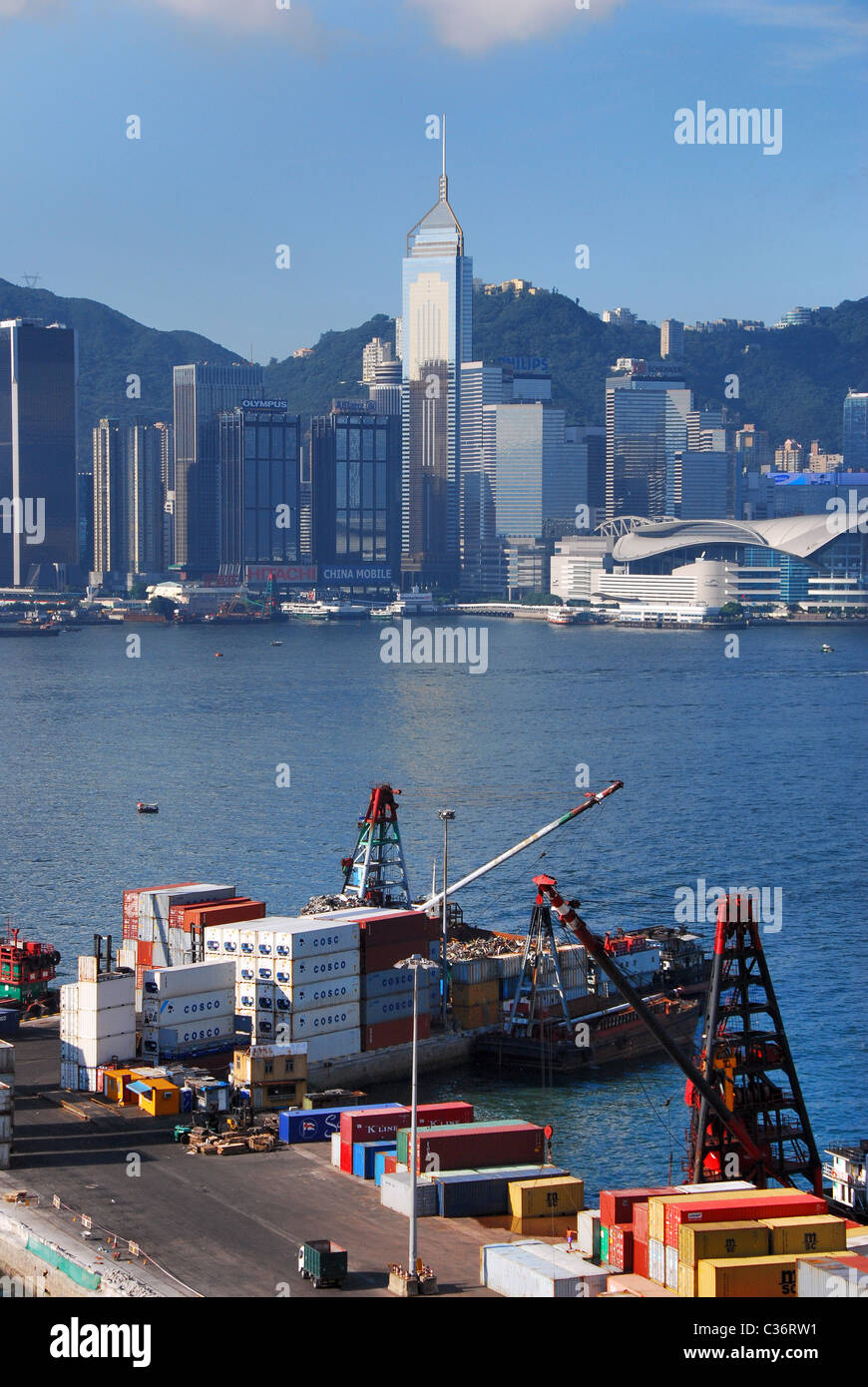 Kowloon container terminal shipping with Kong Kong Island Skyscrapers ...