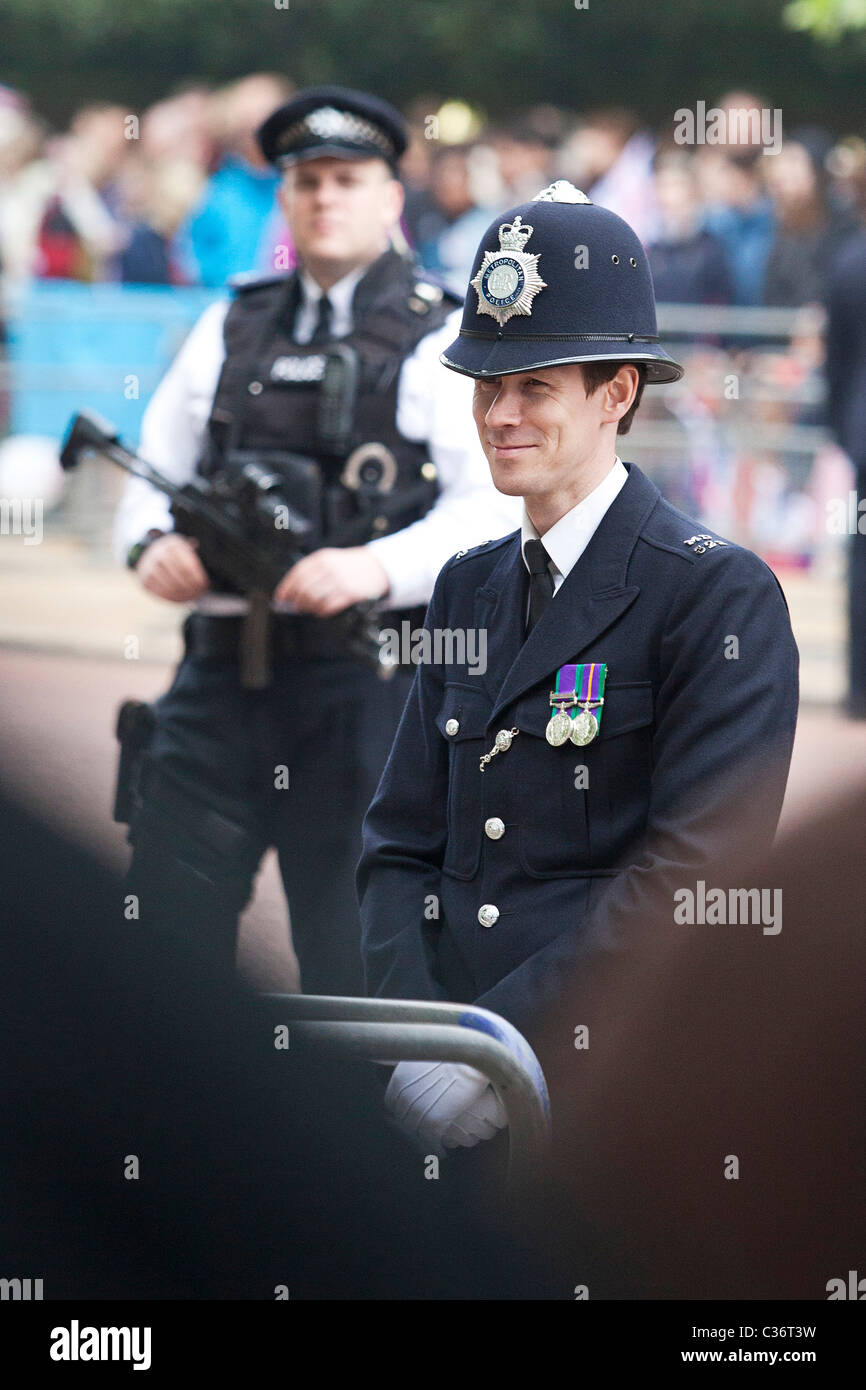 Uk policeman and gun hi-res stock photography and images - Alamy