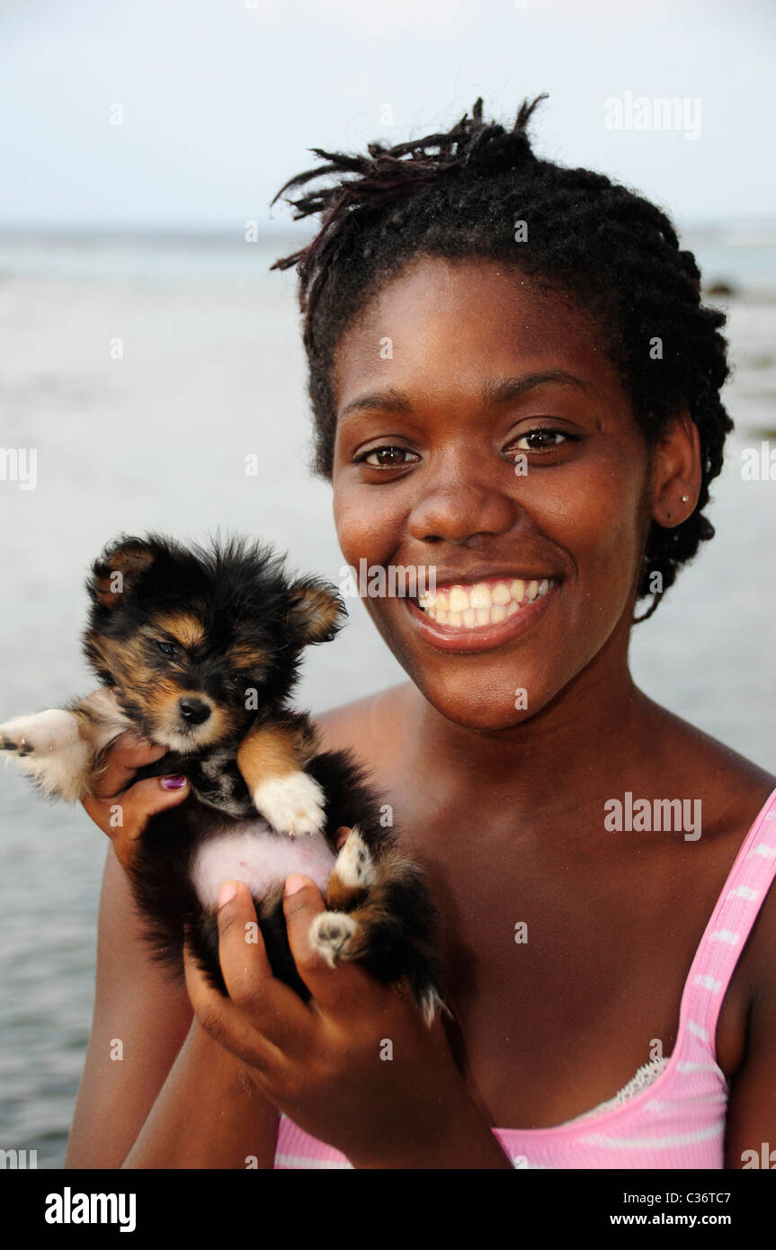 Black women with a little dog Stock Photo - Alamy