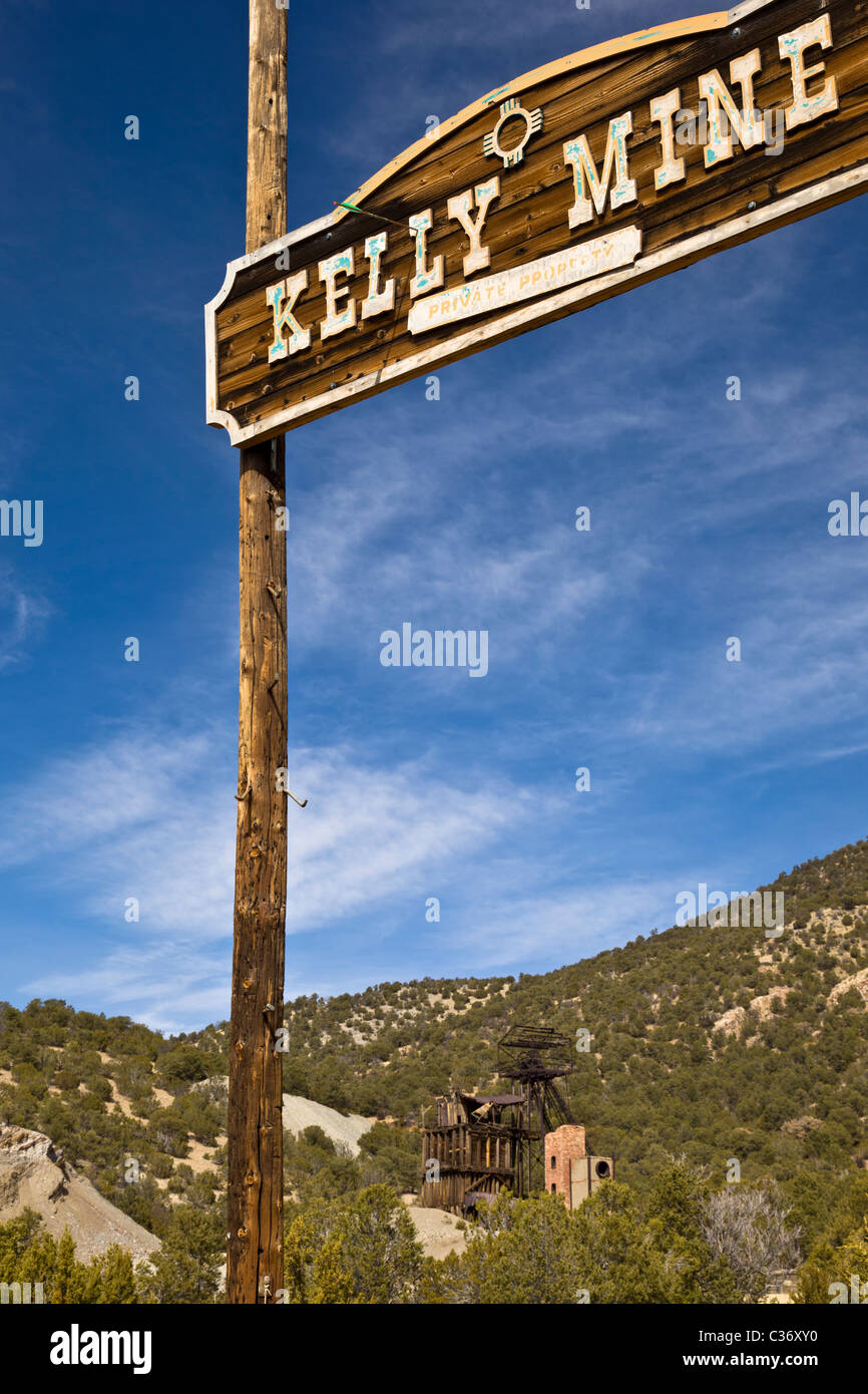 Signpost for the Kelly Mine Ghost Town with the mine headframe and ...