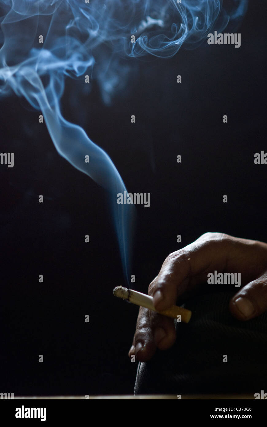 Smoking it's bat for health Stock Photo - Alamy