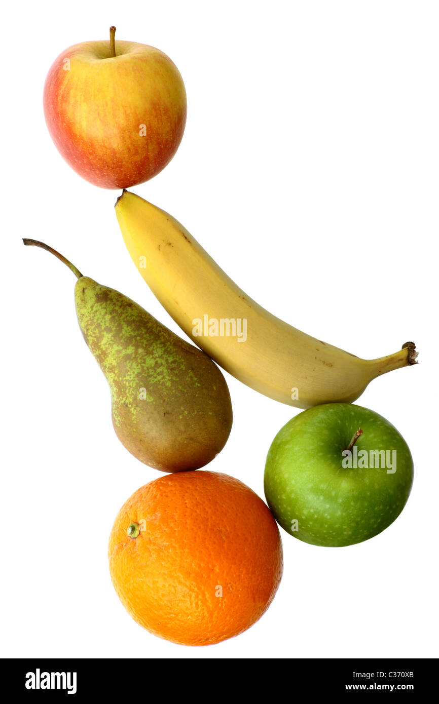 Mixed fruit in a still life arrangement isolated on a white background ...