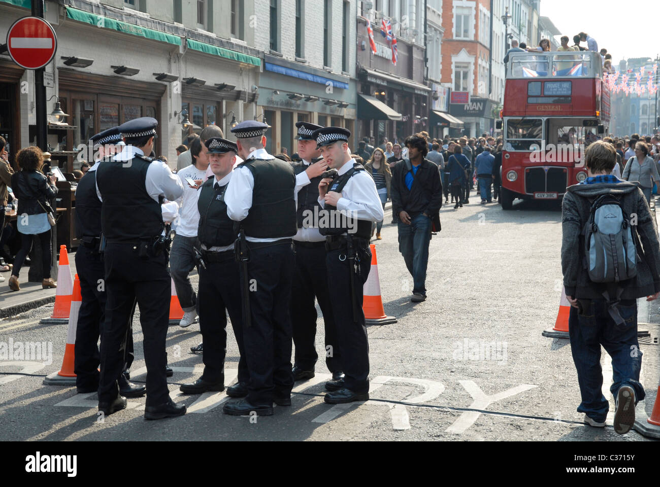 Police in Soho at a street party to celebrate the royal wedding on 29 ...