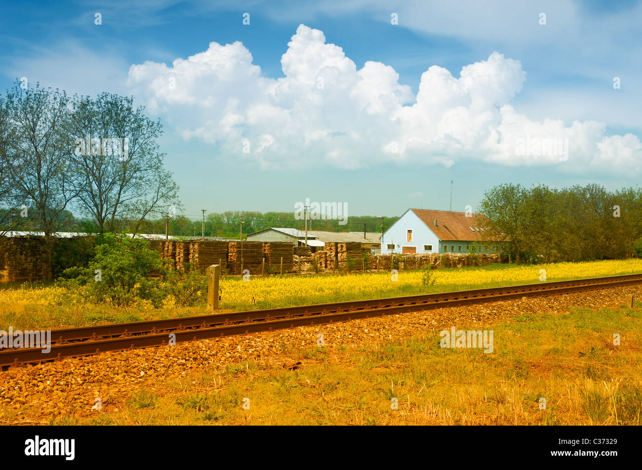 Picturesque landscape with house and rail on countryside Stock Photo ...